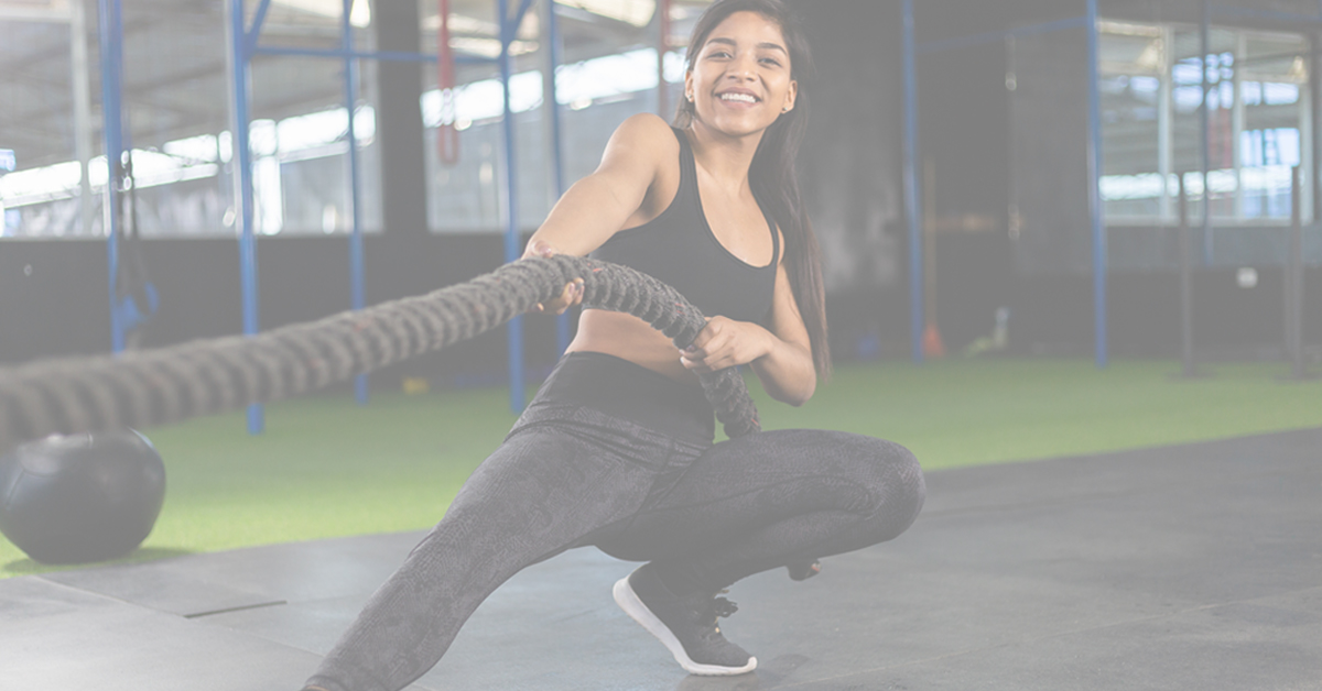 Fitness Woman Rope Pulling - Fitness 1440 Nashville, TN